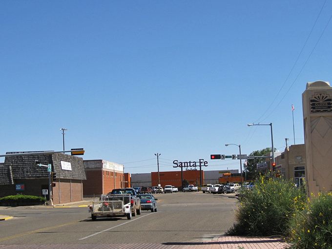 The historic Lyceum Theater stands as a sentinel of Clovis's past, its vintage neon sign glowing against the evening sky like a beacon from another era.