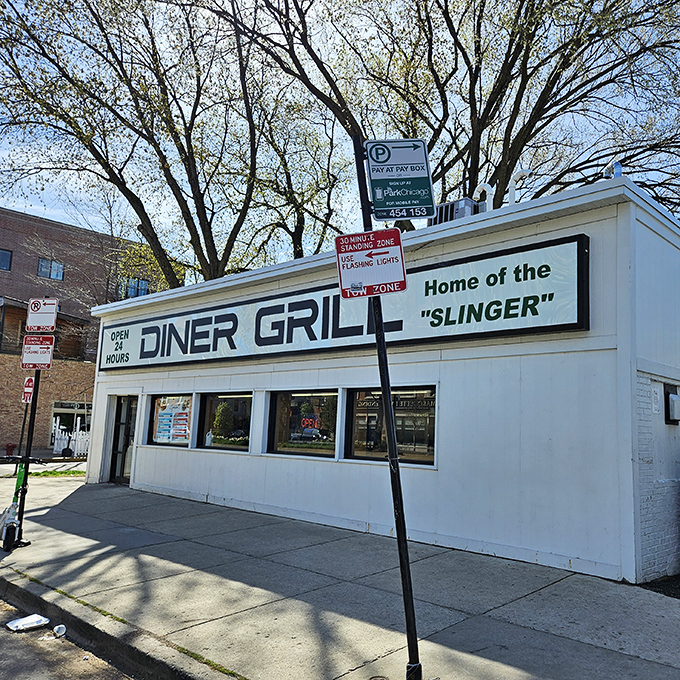 The unassuming white exterior of Diner Grill stands like a beacon of hope for hungry night owls and early birds alike on Chicago's Irving Park Road.