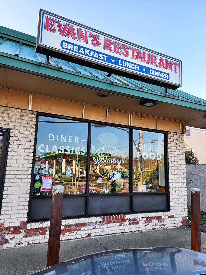 The unassuming brick exterior of Evan's Restaurant promises what every great Jersey diner should: honest food without pretension. No neon, just necessity.