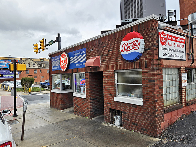 The brick facade of Tom & Joe's proudly announces its breakfast specialty. This unassuming storefront has been Altoona's morning sanctuary for decades.