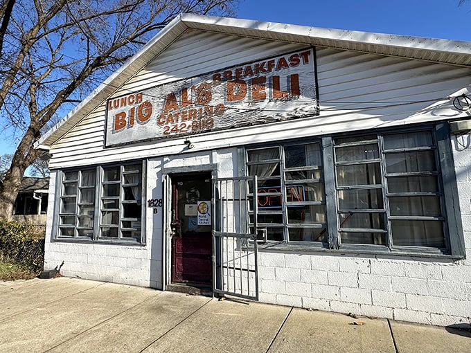 The unassuming white building with bold orange signage stands as Nashville's breakfast fortress, where culinary magic happens without pretense.