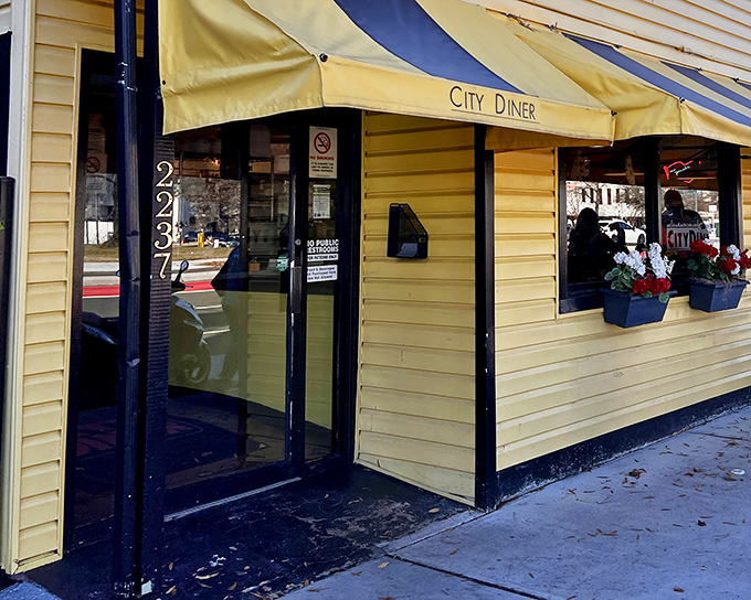 The cheerful yellow exterior of City Diner stands like a beacon of breakfast hope on Richmond's Cary Street.