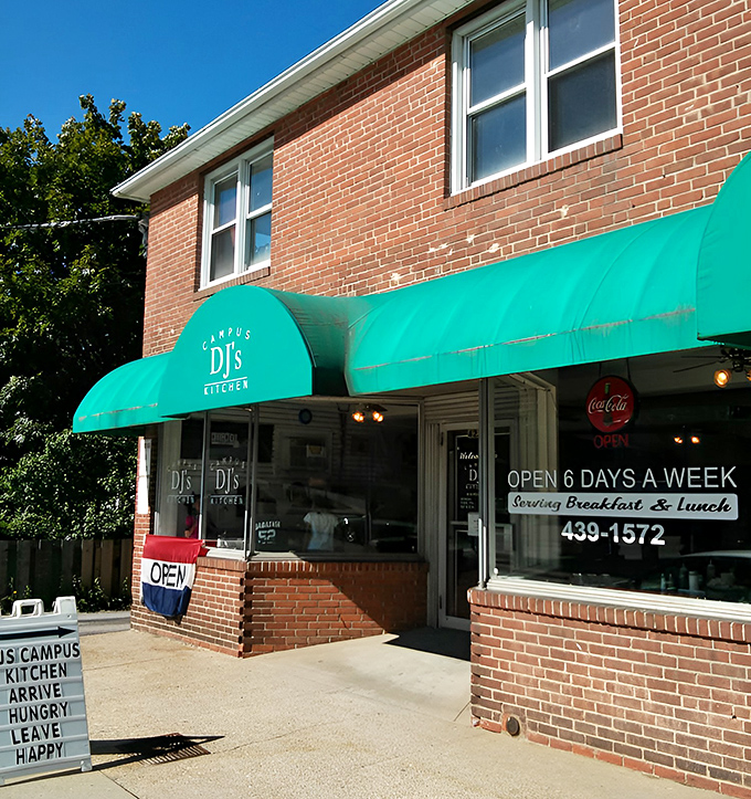 The iconic teal awning of DJ's Campus Kitchen beckons breakfast lovers like a lighthouse for the hungry souls of New London.
