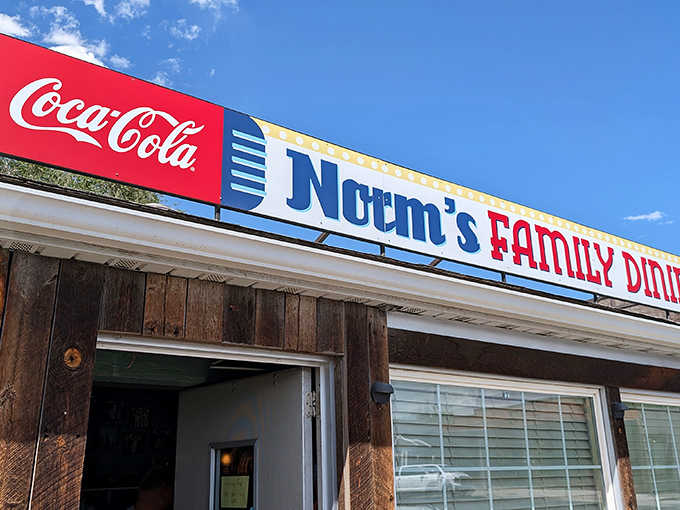 The unassuming exterior of Norm's Family Dining stands like a beacon of breakfast hope in Twin Falls, where pancake pilgrimages begin beneath that iconic red Coca-Cola sign.