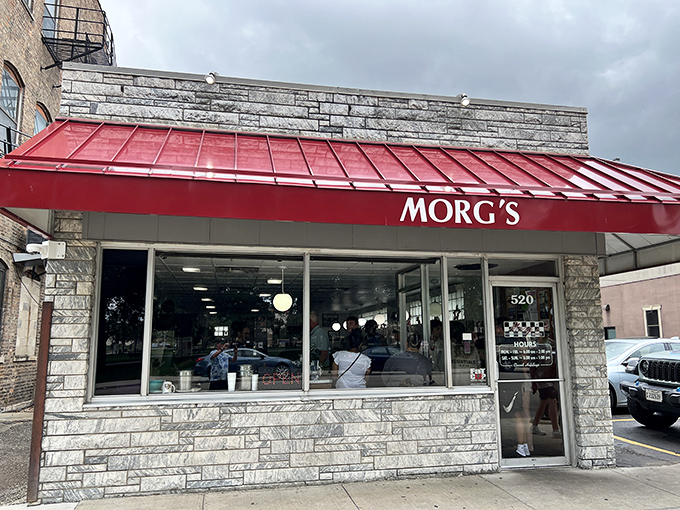 Morg's iconic white building with its bold red script sign stands as a beacon of breakfast hope on Mulberry Street in Waterloo.