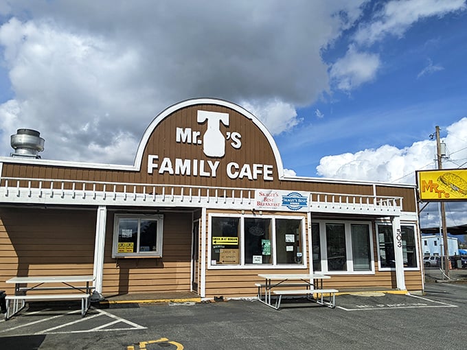 The arched brown exterior of Mr. T's stands like a beacon of breakfast hope along the highway, promising pancake perfection within those humble walls.