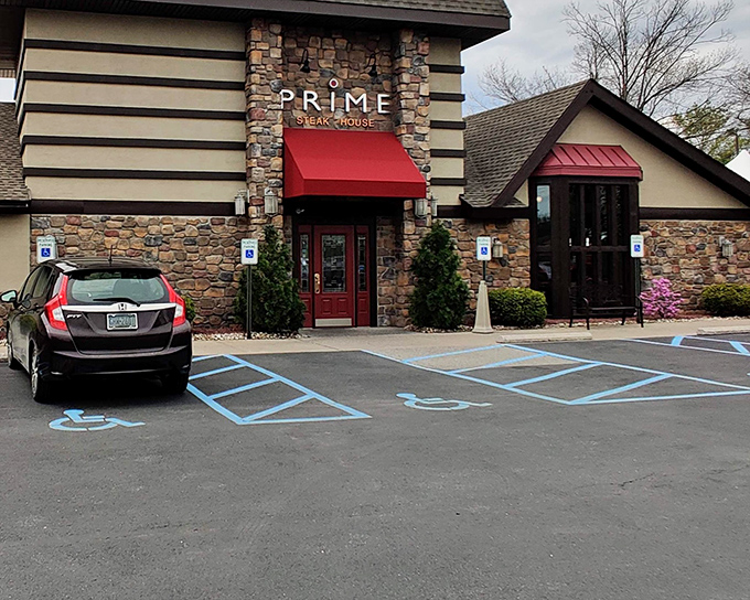 The stone facade of Prime Steak House welcomes hungry travelers with its distinctive red awning and warm lighting&mdash;a carnivore's lighthouse on the Bethlehem horizon.