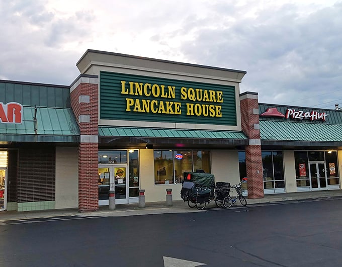 The green and yellow beacon of breakfast hope stands proudly in an Indianapolis strip mall, promising pancake perfection to all who enter.