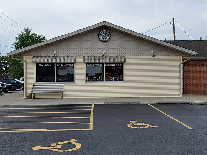 The unassuming exterior of Nutcracker Family Restaurant hides culinary treasures within. Those striped awnings practically whisper, "Come in, the pie is waiting."