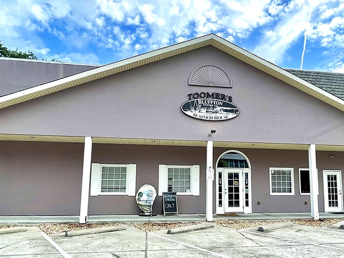 The unassuming exterior of Toomer's Bluffton Seafood House proves once again that culinary treasures often hide in plain sight. South Carolina's seafood secret awaits!