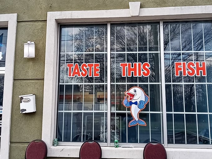 The storefront says it all: bold red letters commanding you to "TASTE THIS FISH," with a cartoon fish that seems to be winking at your good decision.
