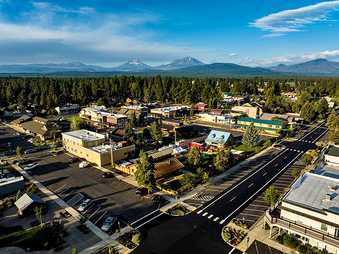 Sisters' Western-themed storefronts stand like a movie set against the breathtaking backdrop of snow-capped Cascade peaks, proving small towns can deliver big views.