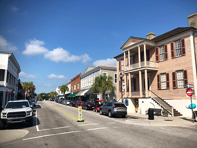 Bay Street's colorful storefronts invite leisurely exploration, where brick buildings house boutiques and eateries that locals have treasured for generations.