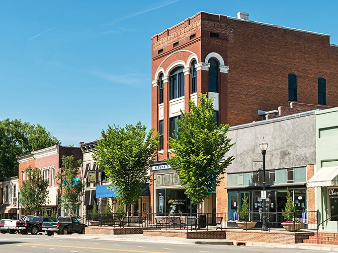 Downtown Milledgeville's historic brick buildings stand like sentinels of Southern charm, where modern businesses thrive within walls that have witnessed centuries of Georgia history.