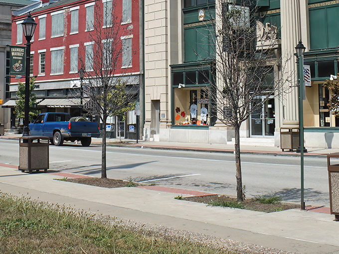 Vibrant red brick storefronts line Waynesburg's main street, where historic charm meets small-town practicality. The kind of place where even traffic lights seem unhurried.