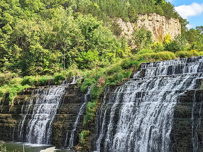 Nature's perfect staircase &ndash; Thunder Bay Falls cascades down limestone shelves, creating a mesmerizing display that hypnotizes visitors and silences even the chattiest companions.
