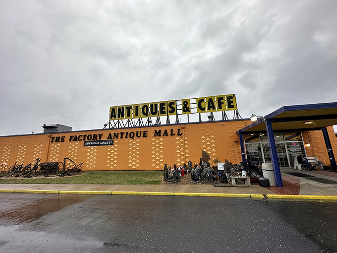 Bright yellow signs invite you into this massive orange building, where endless treasures and a cozy cafe await your discovery.