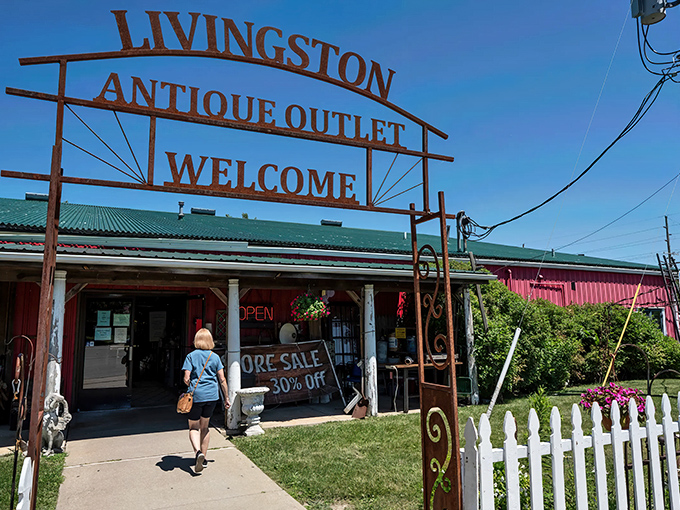 The iconic red barn exterior of Livingston Antique Outlet stands out against the Michigan sky like a beacon calling all treasure hunters home.