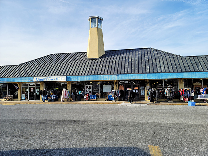 The iconic yellow bell tower of All Saints' Parish Thrift Shop stands like a lighthouse for bargain hunters navigating the sea of retail options in Lewes.