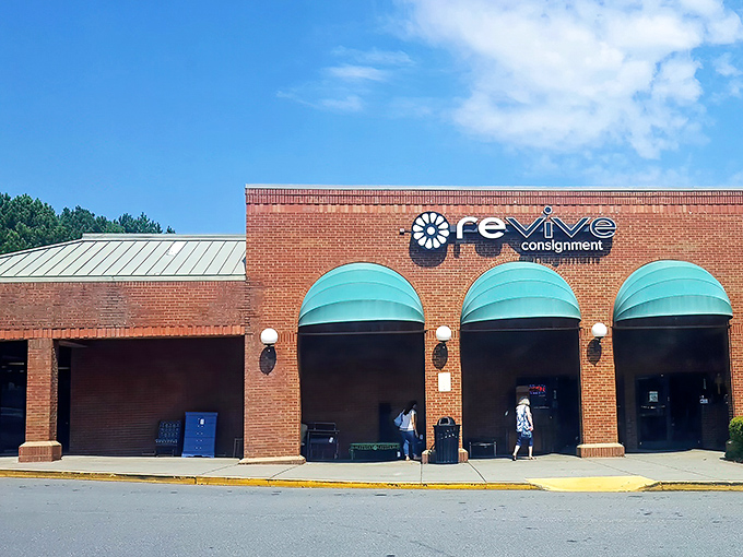 Revive's distinctive brick fa&ccedil;ade with teal awnings stands like a beacon for bargain hunters. It's not just a store&mdash;it's a treasure hunt with a roof.
