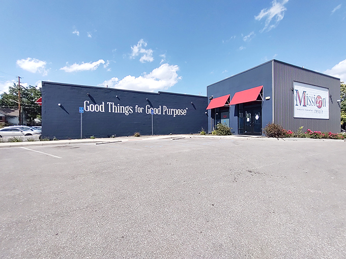 The navy blue exterior with striking red awnings makes Mission 27 Resale stand out like a fashionable thumb on Indianapolis' Shelby Street.