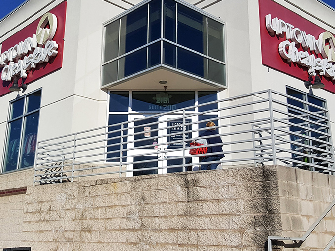 The bright red signage of Uptown Cheapskate beckons like a lighthouse for the fashion-forward bargain hunter. No buyer's remorse allowed here!