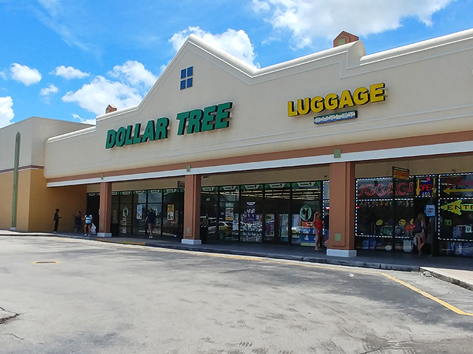 The green and yellow Dollar Tree sign shines like a beacon of hope for bargain hunters on International Drive, promising treasures that won't break the bank.