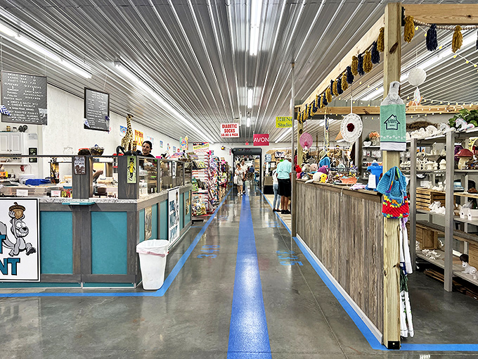 Wide aisles with blue-striped floors guide you through this treasure hunter's paradise. The metal ceiling reflects both light and possibility.