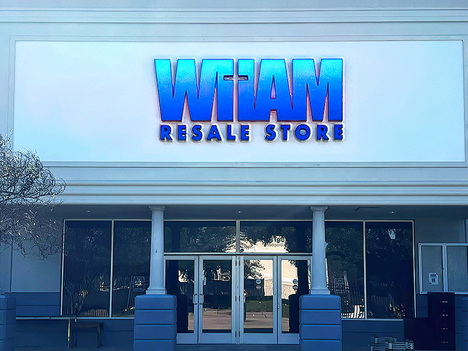 The iconic blue WHAM sign welcomes treasure hunters like a beacon of secondhand possibility. Behind those doors? Pure thrifting magic awaits.