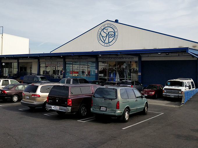 The blue-and-white exterior promises treasure hunting paradise within, where budget-friendly discoveries and planet-saving missions unite under one expansive roof.