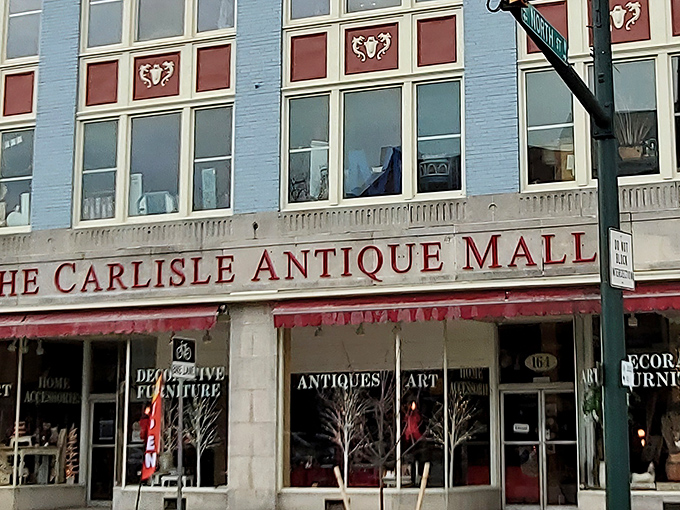 The iconic blue and red fa&ccedil;ade of The Carlisle Antique Mall beckons like a siren song for vintage enthusiasts on Carlisle's historic main street.