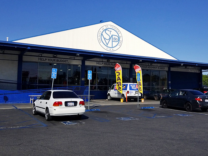 The blue-and-white exterior promises treasure hunting paradise within, where budget-friendly discoveries and planet-saving missions unite under one expansive roof.