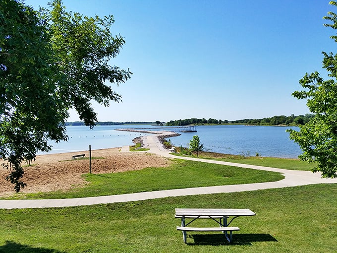 Golden sands curve along crystal-clear waters under a Midwest sky that seems to go on forever. Missouri's best-kept beach secret awaits.