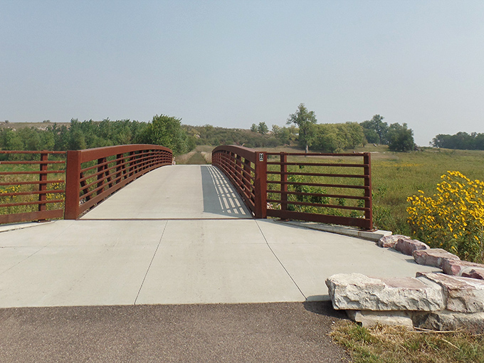 The dramatic quartzite cliffs of Blue Mounds rise like nature's skyscrapers from the prairie, a geological marvel that would make the Grand Canyon blush with envy.