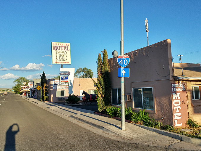 Main Street Seligman stretches before you like a living museum, where classic Americana meets desert sky in a perfect postcard of nostalgia.