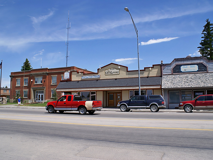 Main Street Driggs &ndash; where Norman Rockwell meets mountain majesty. Those green lampposts and American flags aren't just decoration; they're a promise of small-town authenticity.