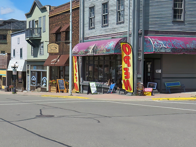 Sheridan Street stretches before you like a Norman Rockwell painting come to life, where every traffic light feels like an invitation to slow down and stay awhile.