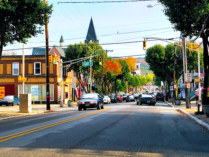 Main Street stretches before you like a Norman Rockwell painting come to life, where traffic lights are merely suggestions to slow down and notice the details.