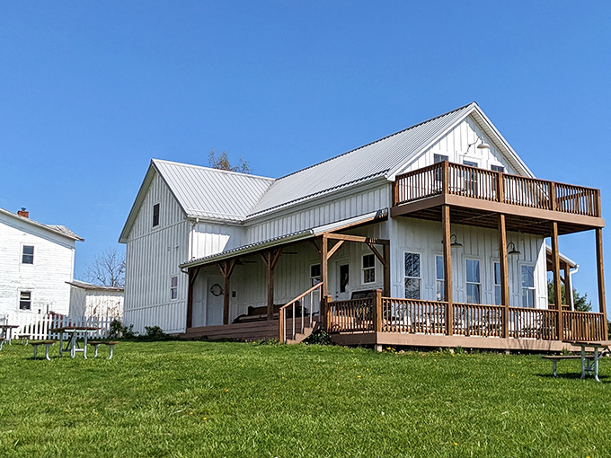 The white farmhouse winery stands proudly against the blue Ohio sky, its wraparound deck practically begging you to sit a spell with something chilled and delicious.