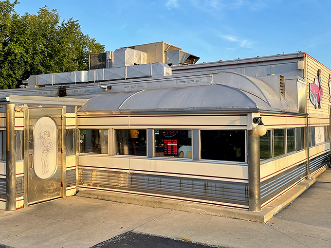 The classic Americana exterior of Nancy's beckons with its roller-skating waitress mural and vintage signage&mdash;a time capsule of diner culture waiting to be explored.
