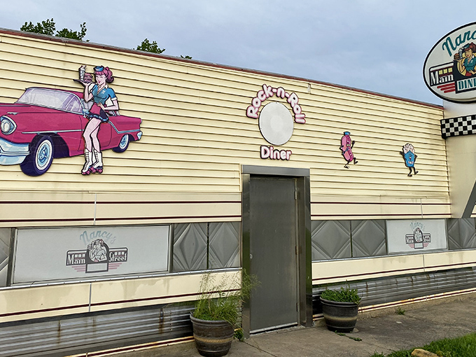 The classic Americana exterior of Nancy's beckons with its roller-skating waitress mural and vintage signage&mdash;a time capsule of diner culture waiting to be explored.