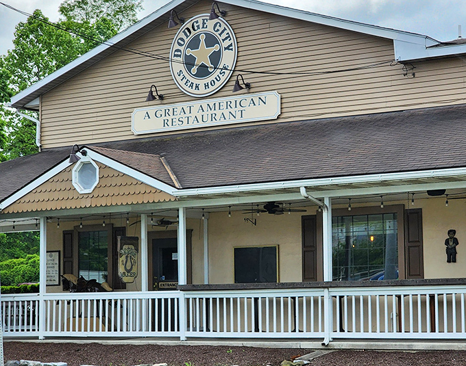 The Western frontier meets Pennsylvania hospitality at Dodge City Steakhouse's inviting exterior. That star logo isn't just for show&mdash;it's practically a beacon for hungry travelers.