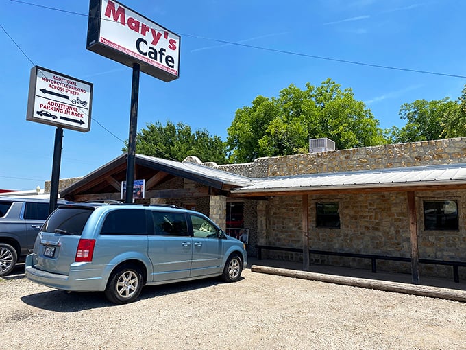 The unassuming exterior of Mary's Cafe stands proudly against the Texas sky &ndash; proof that culinary greatness often comes in humble packages.