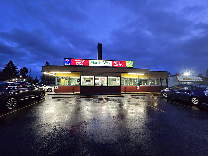 The unassuming exterior of Martin Way Diner stands like a beacon in the Washington rain, promising comfort food salvation to hungry travelers.