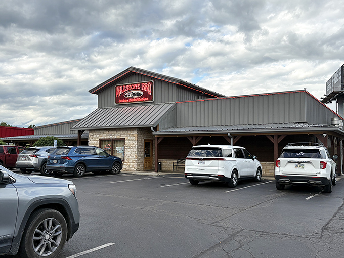 This unassuming stone-and-metal fa&ccedil;ade might look modest, but it's actually a barbecue cathedral where smoke-scented miracles happen daily.