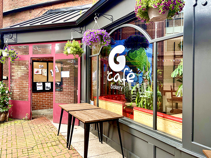 The storefront beckons like an old friend, with its tan facade and large windows offering glimpses of culinary happiness within. New Haven's brick sidewalks lead right to deliciousness.