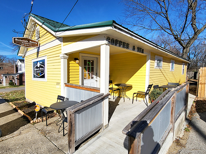 The cheerful yellow exterior with its bright red door isn't just inviting&mdash;it's practically shouting "Get in here and eat something delicious!" Small but mighty, this cottage houses some serious culinary magic.