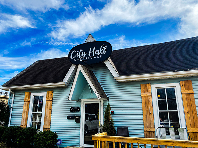 The charming blue cottage with wooden shutters practically whispers "come on in" &ndash; Mississippi's answer to Willy Wonka's factory, but for cheesecake enthusiasts.
