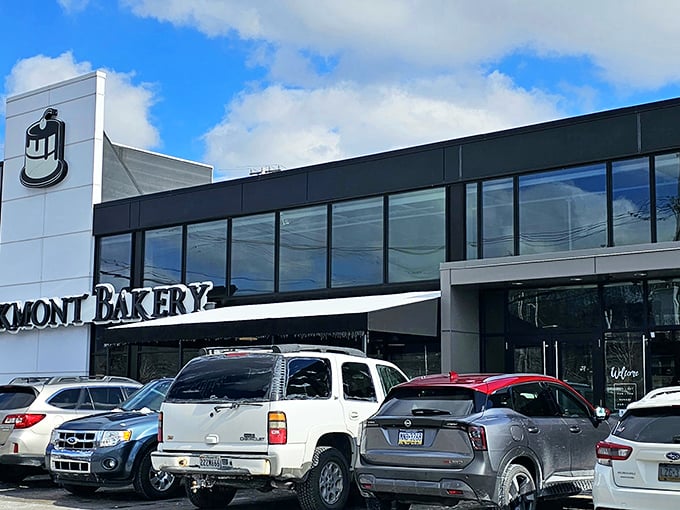 The iconic Oakmont Bakery sign stands like a beacon of hope for the sugar-deprived. This modern temple of temptation promises sweet salvation inside.
