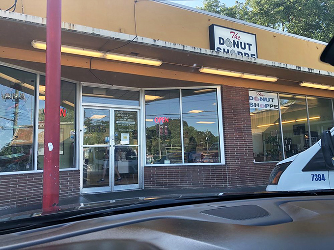 The unassuming storefront of The Donut Shoppe stands as a beacon of sweet salvation for Jacksonville's early risers. No fancy frills, just donut thrills.